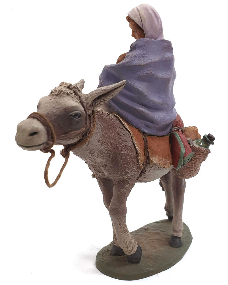 Mary and Jesus over donkey