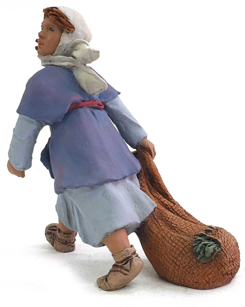 Girl dragging a sack